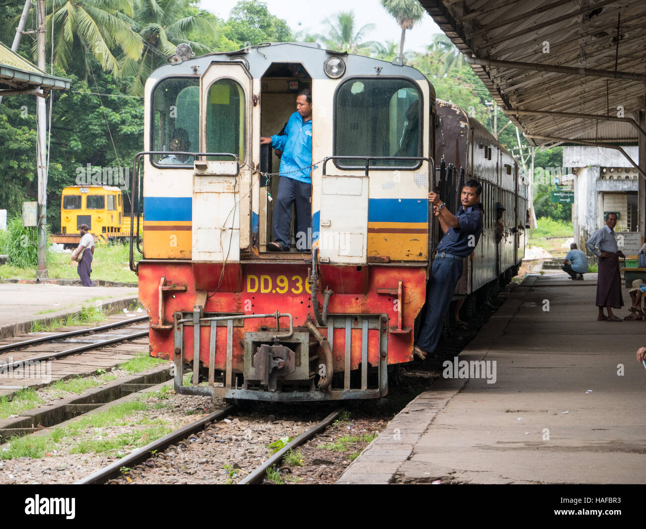 Passenger train arriving at Yangon Central Railway Station, Myanmar ...