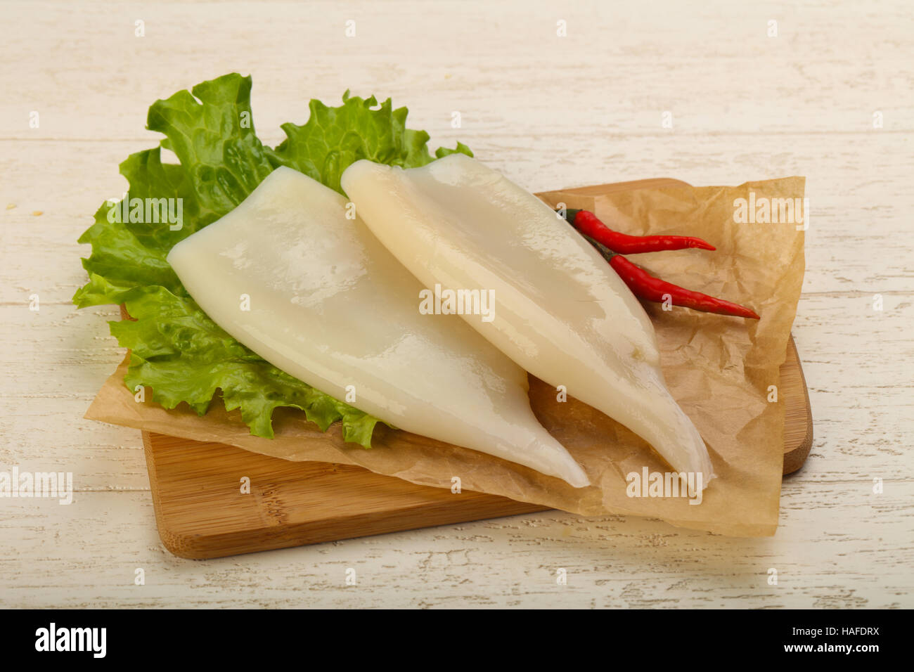 Raw squid fillet ready for cooking Stock Photo - Alamy