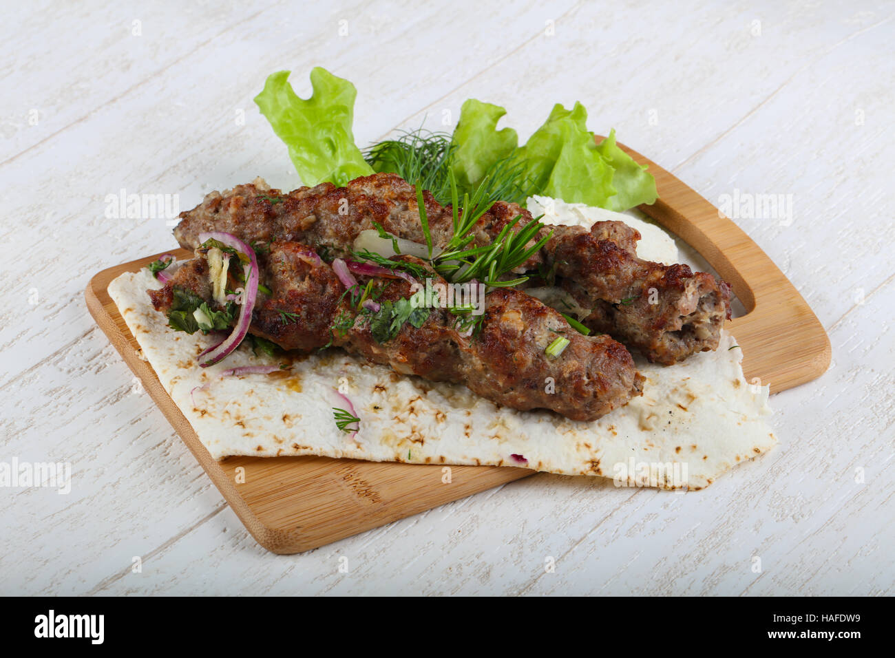 Lamb kebab with onion and rosemary Stock Photo - Alamy