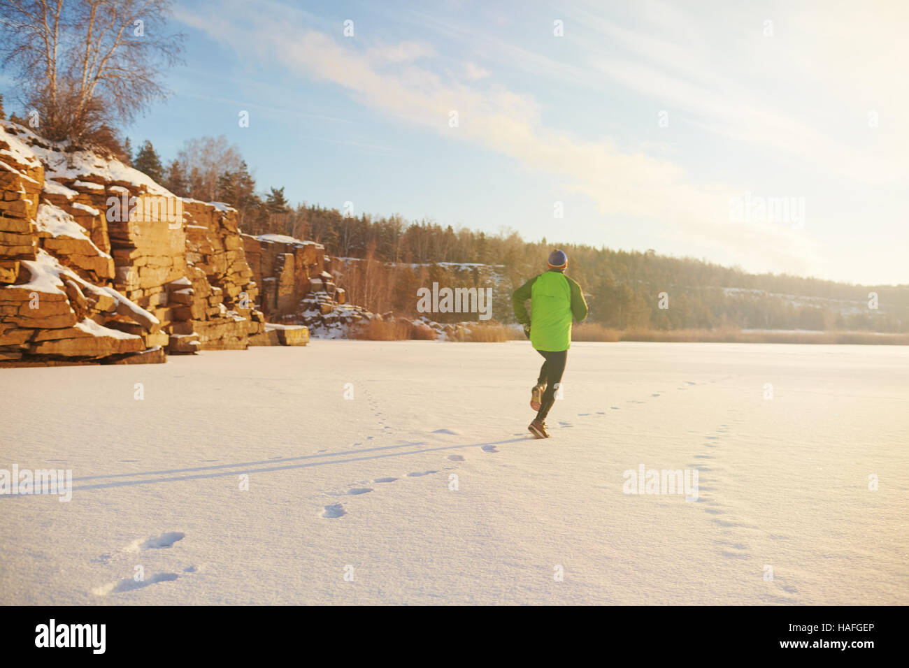 Active man running in the morning in natural environment Stock Photo ...
