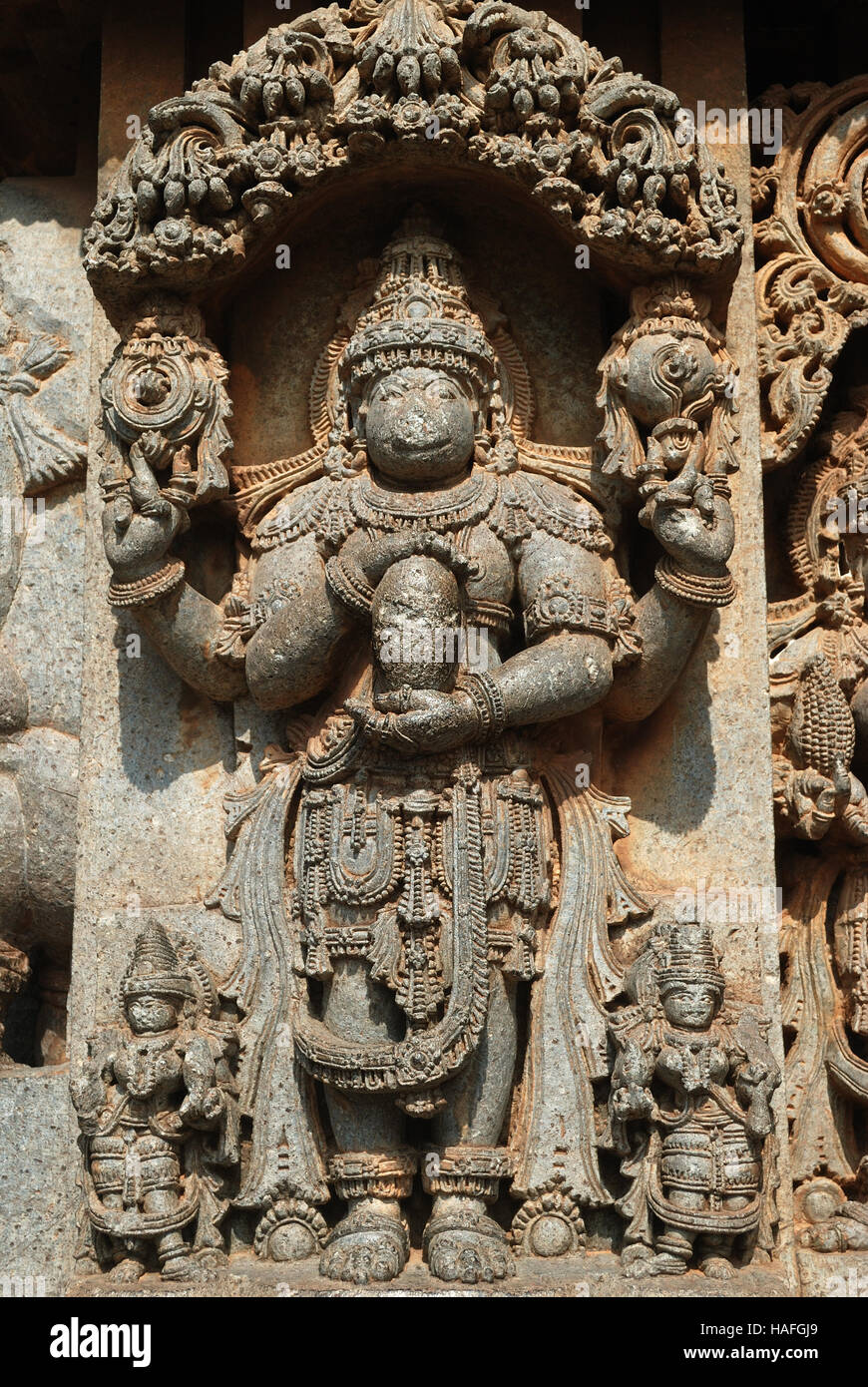 stone carving of hindu god holding a an egg somnathpur,india Stock ...