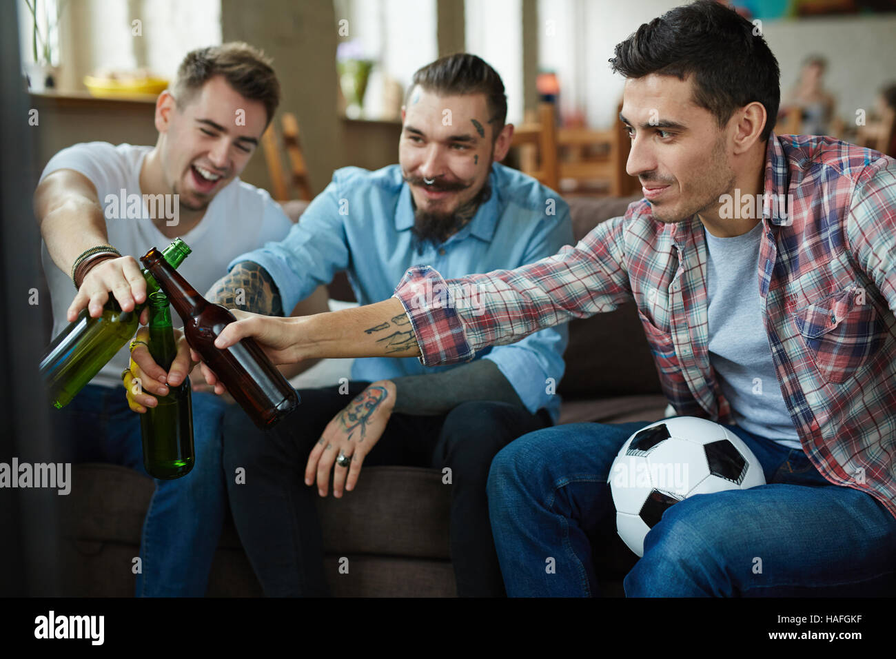 Football fans cheering beer hi-res stock photography and images - Alamy