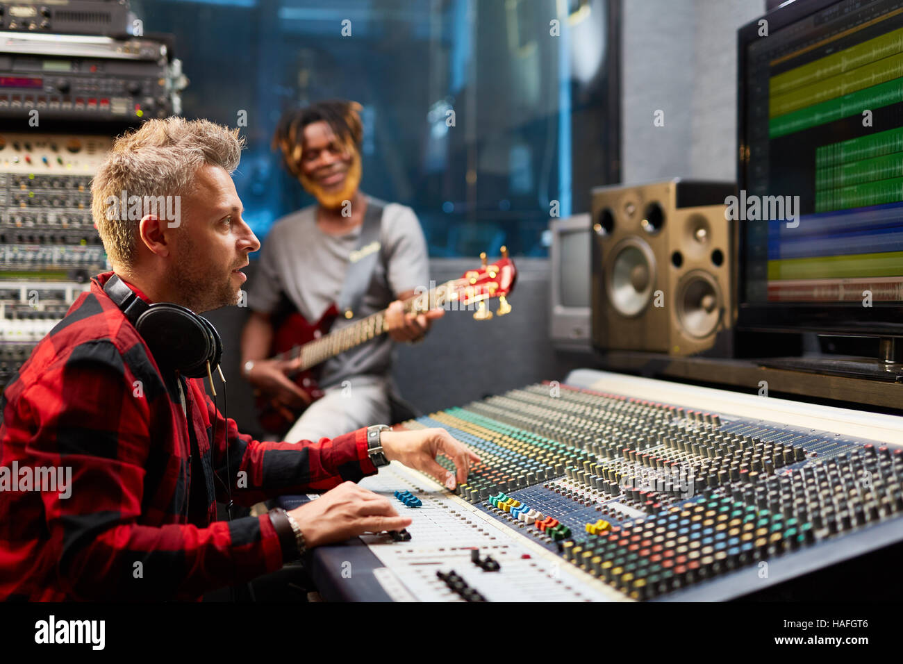 Adjusting the volume hi-res stock photography and images - Alamy