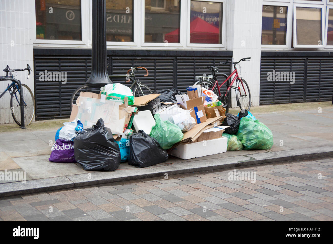 Lower Marsh, near Waterloo Station, Lambeth, London, Rubbish ready to ...