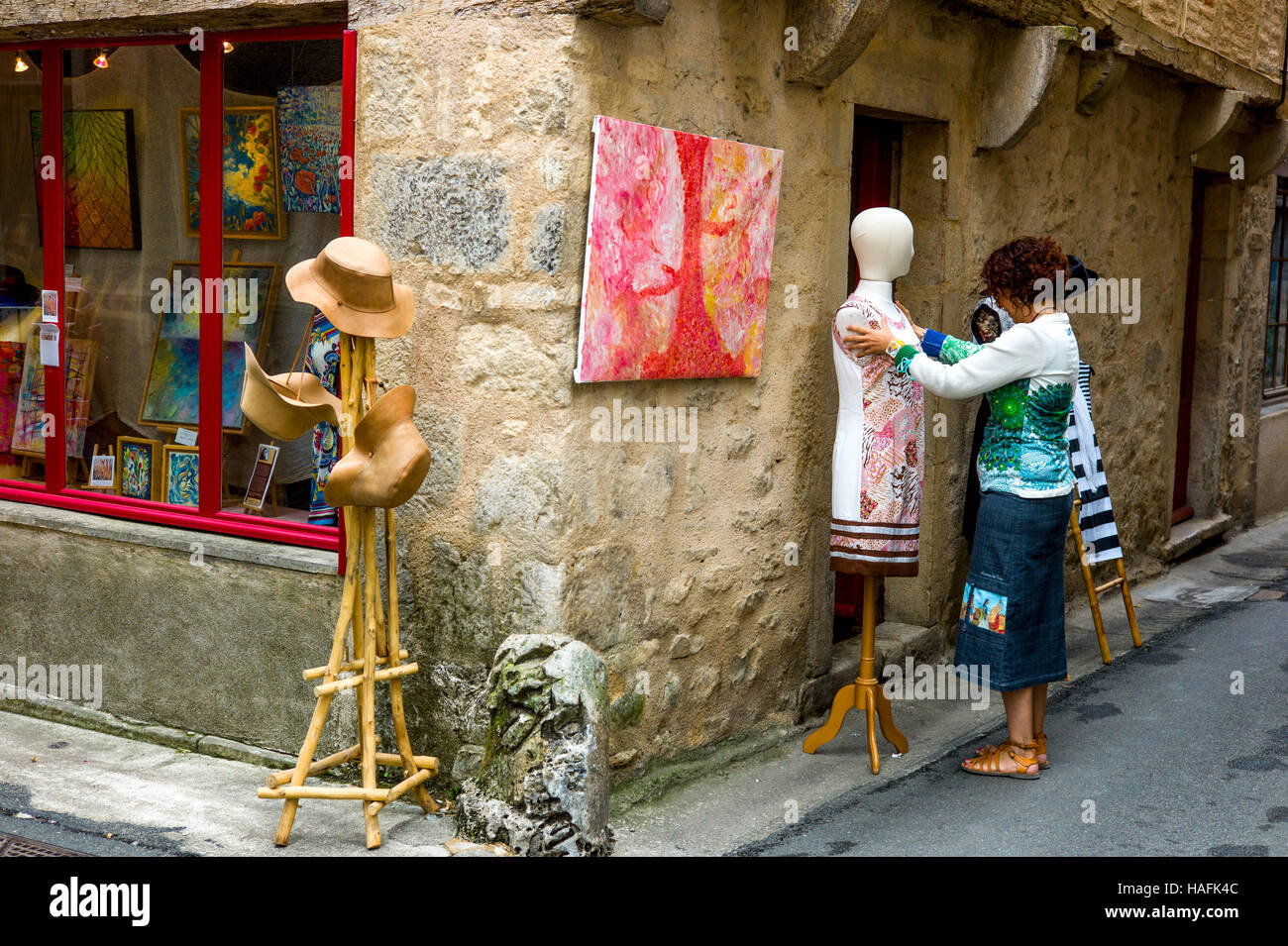 woman outside art shop in France Stock Photo - Alamy