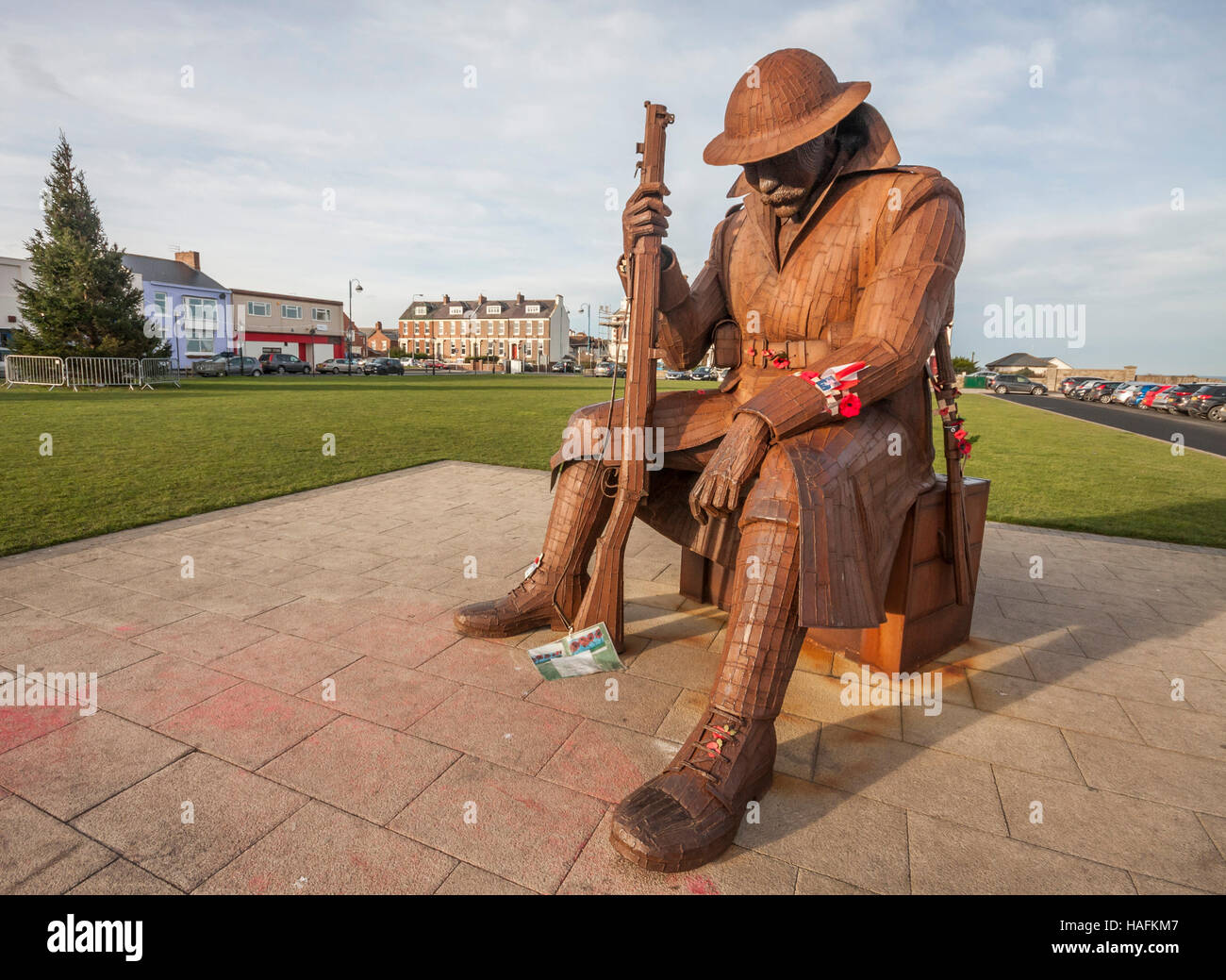 A memorial sculpture by artist Ray Lonsdale of a war weary soldier from ...