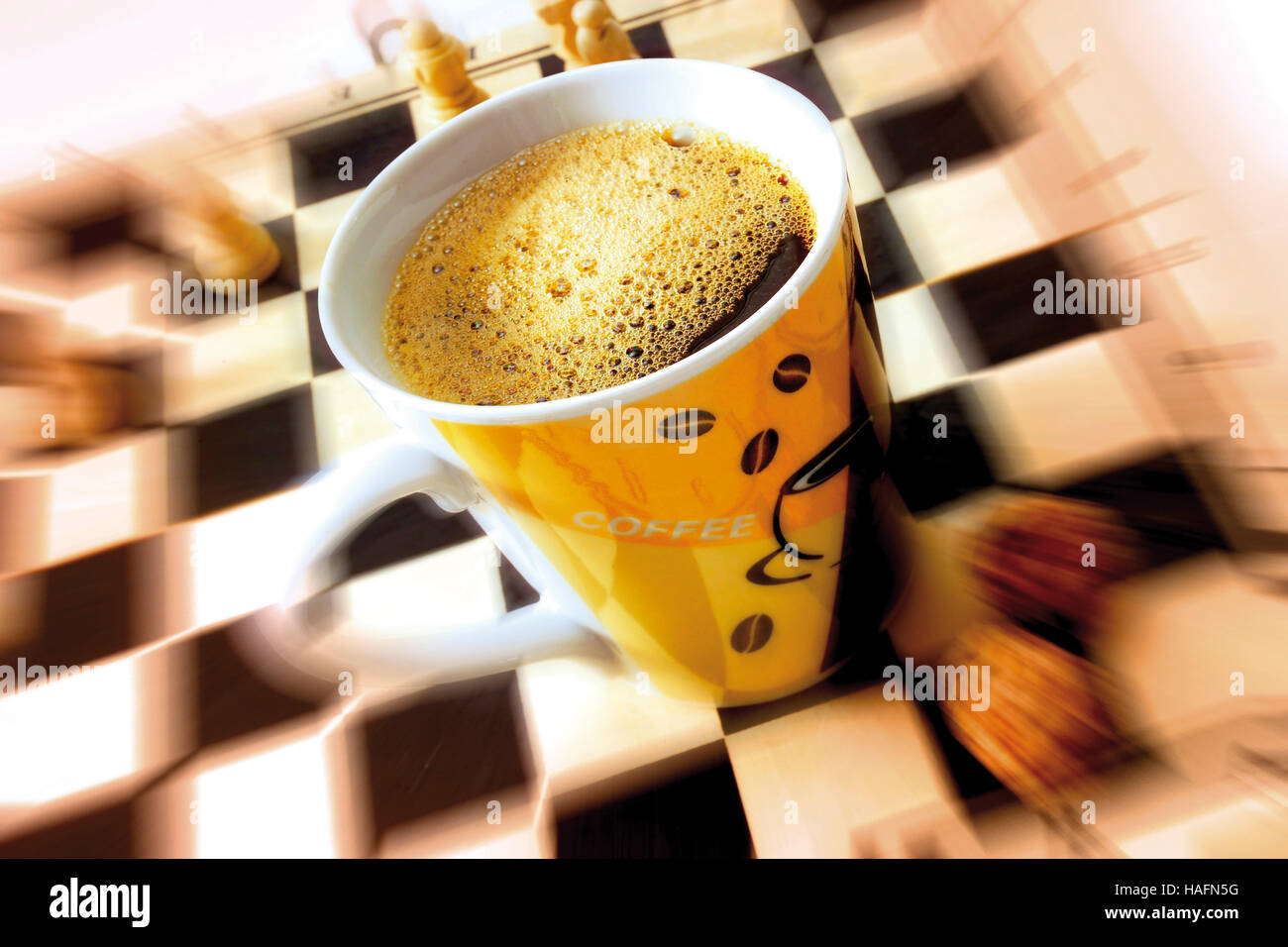 Cup of coffee on a chess-board Stock Photo - Alamy