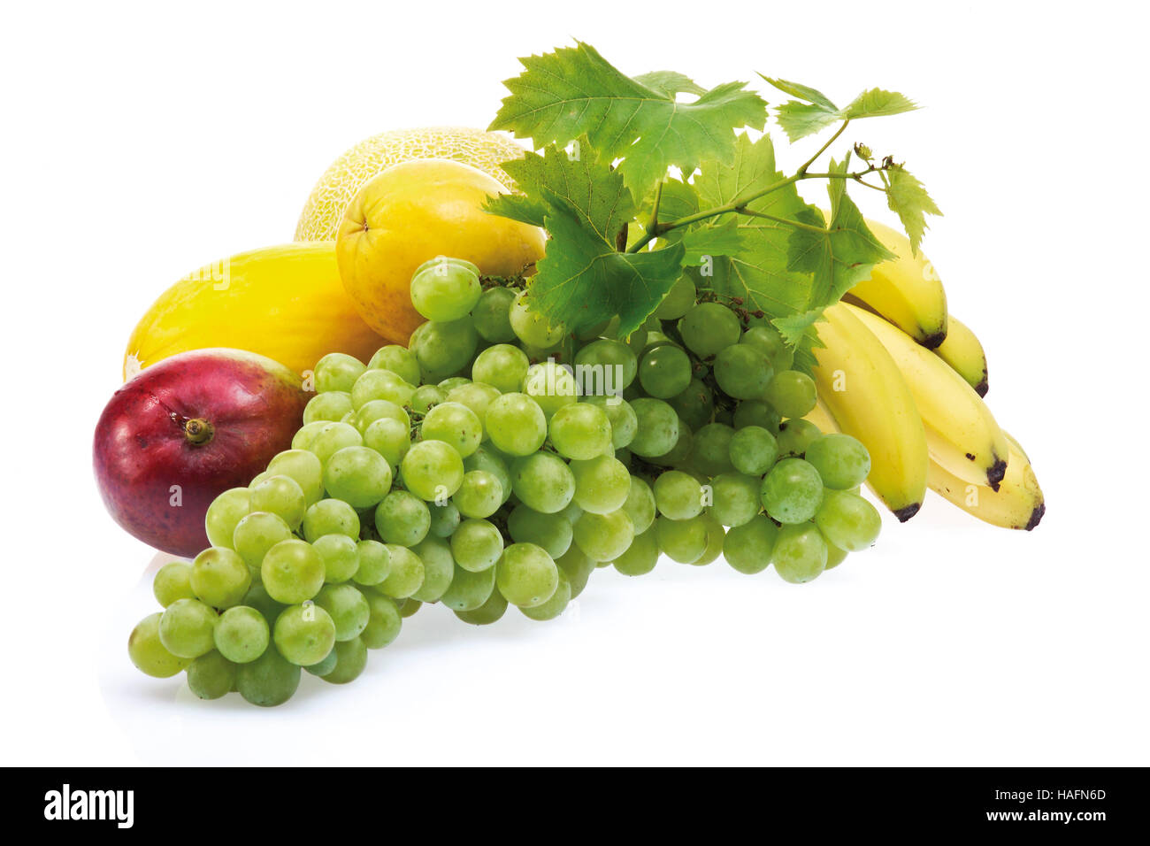 Mixed fruit, bananas, grapes, mango, papaya, melons Stock Photo - Alamy