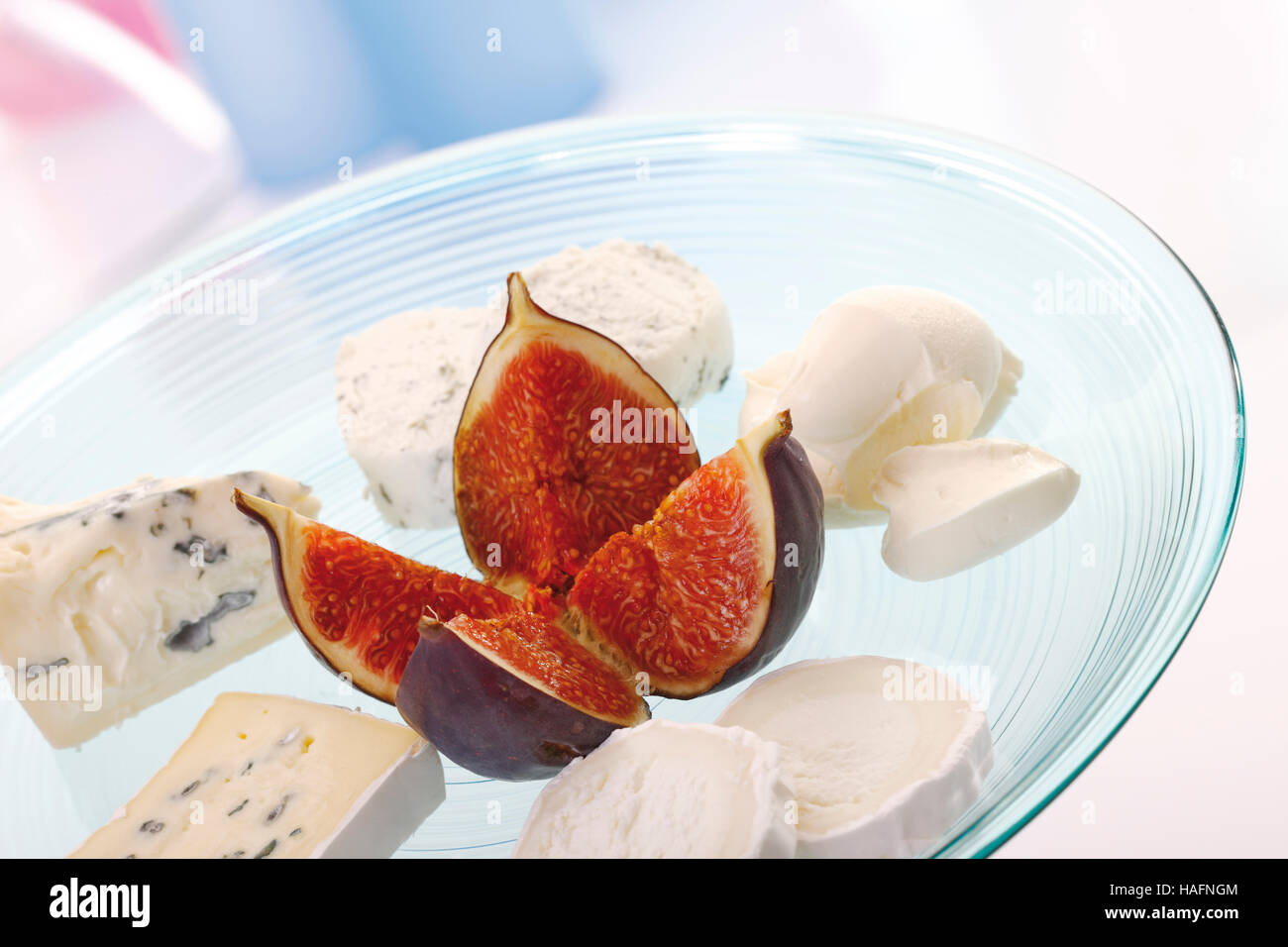 Fresh figs and assorted cheese, blue veined cheese, goat cheese ...