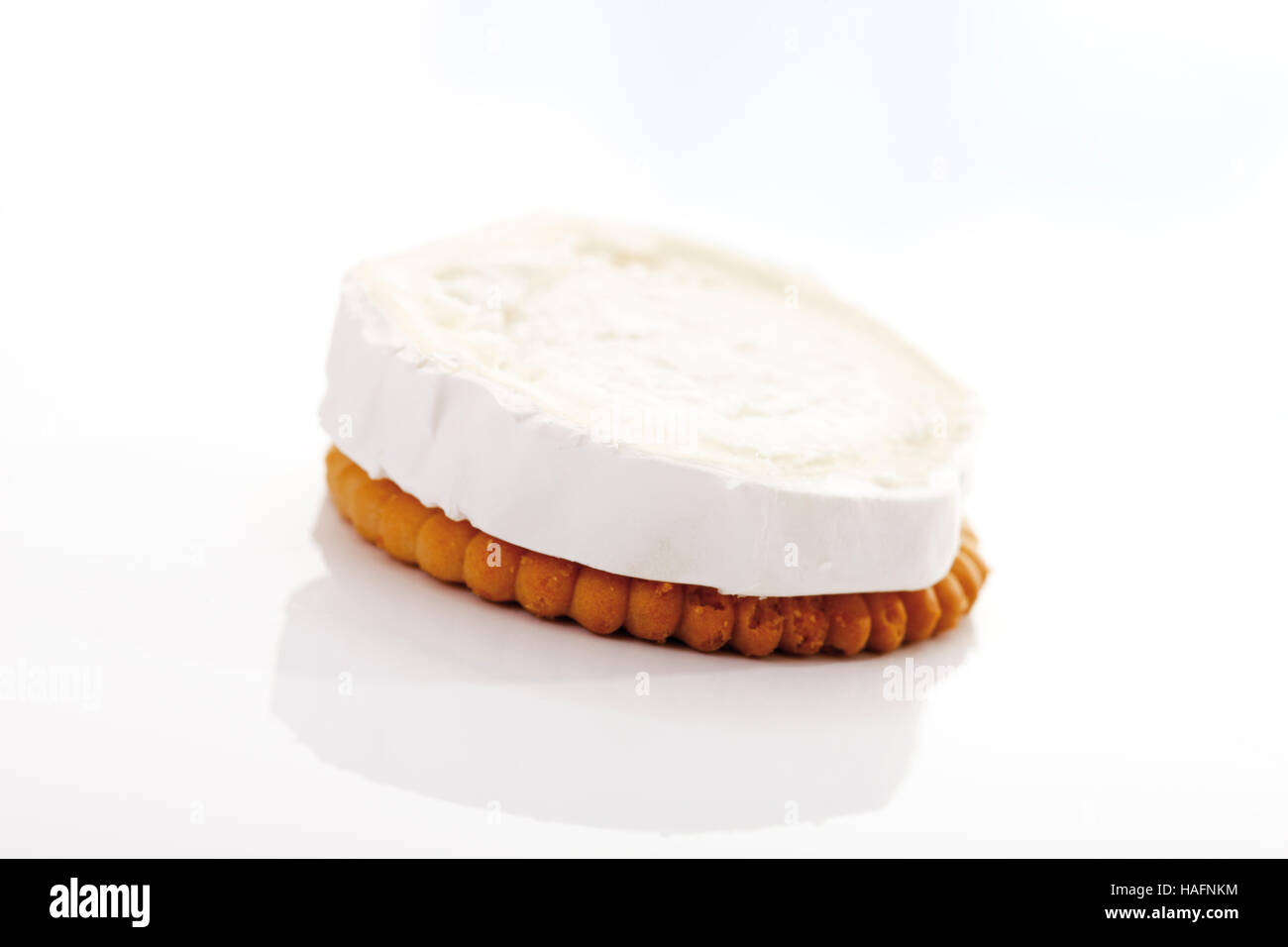 Cheese cracker topped with goat cheese Stock Photo - Alamy
