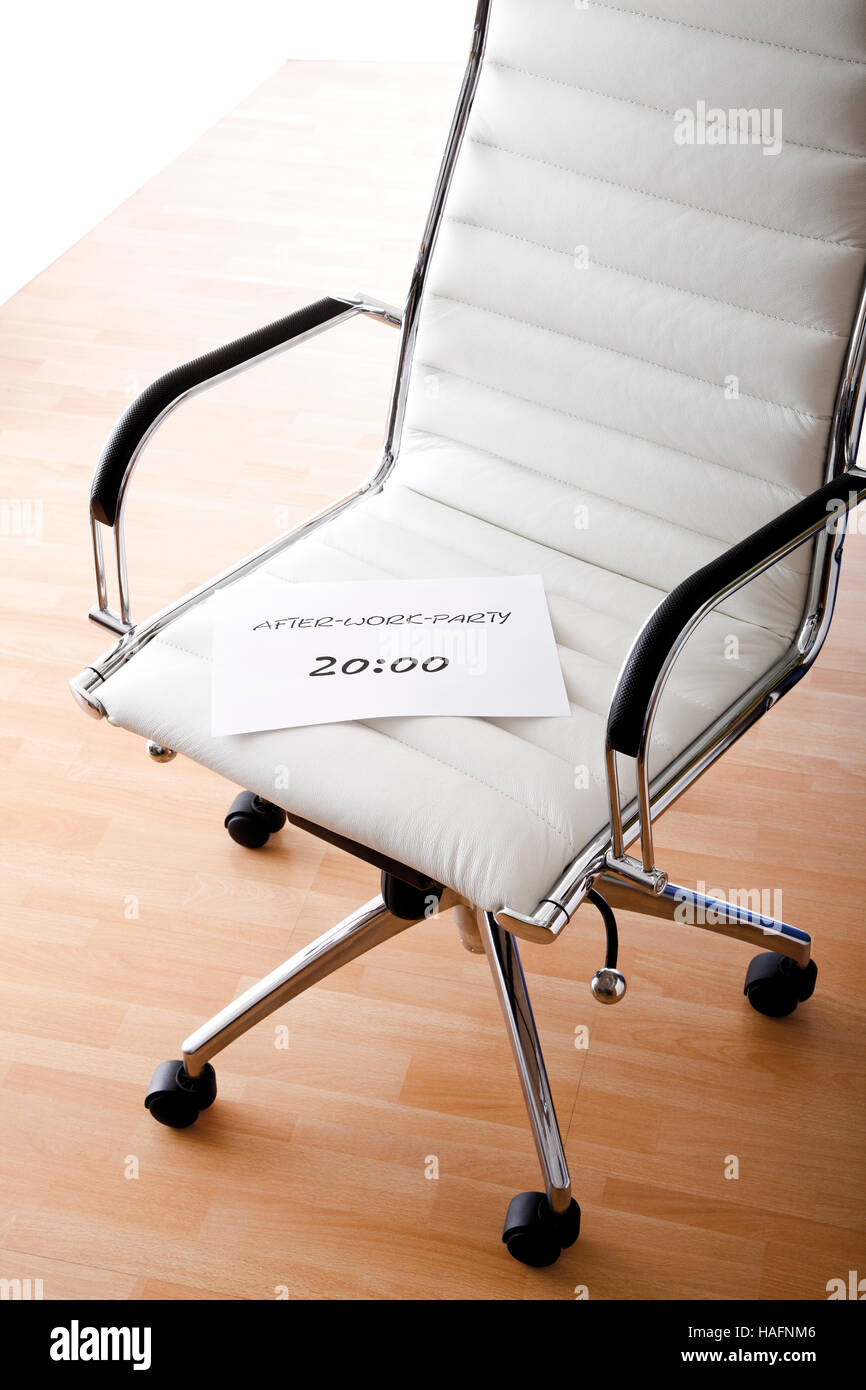 AFTER-WORK-PARTY 20 UHR or 8 o'clock, sign on an office chair Stock ...