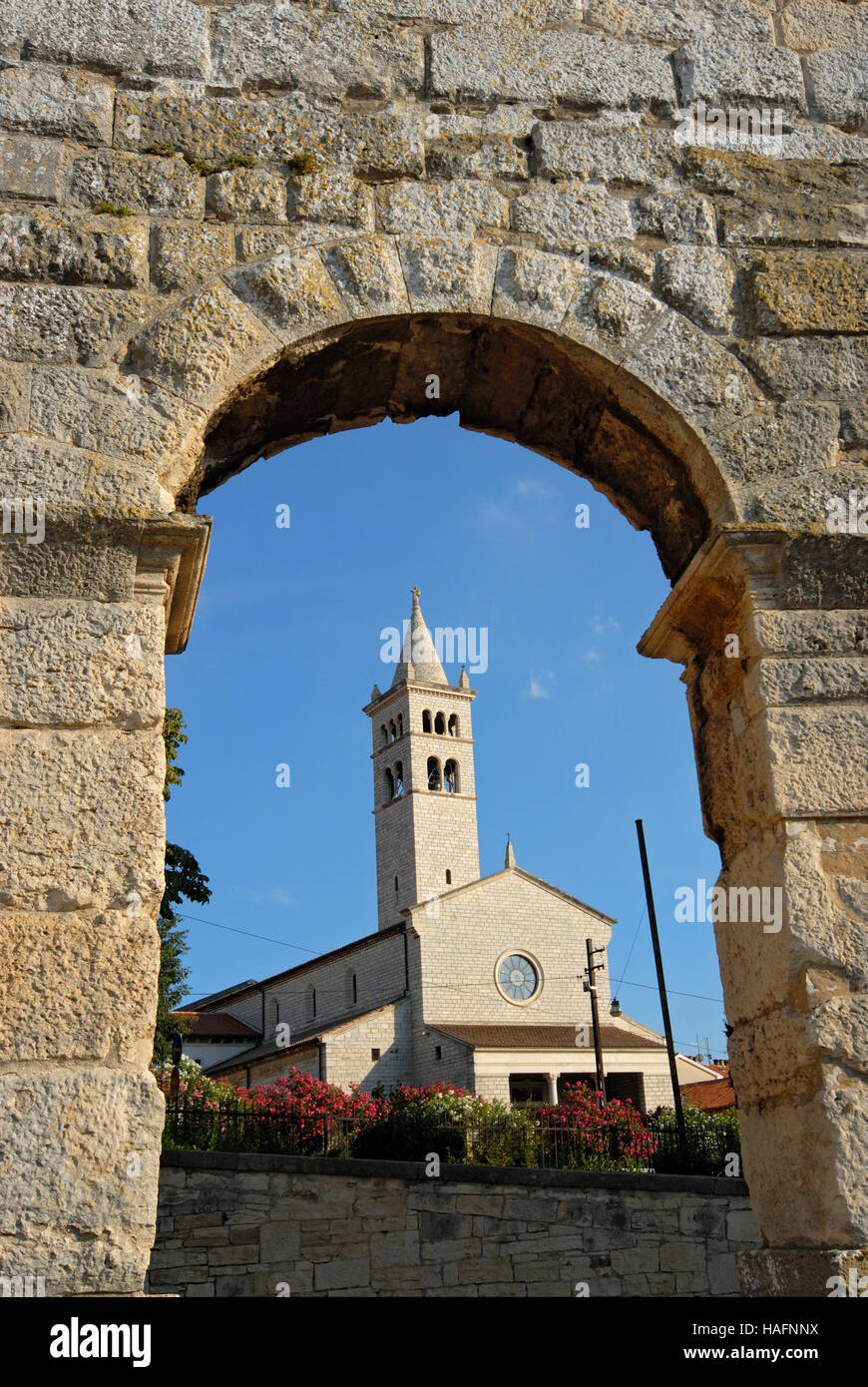 St. Anthony s Church seen through arch of ancient Roman amphitheater ...