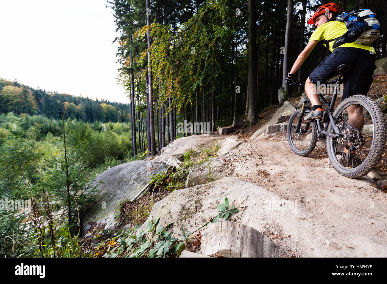 Mountain biker riding on bike in autumn inspirational mountains ...