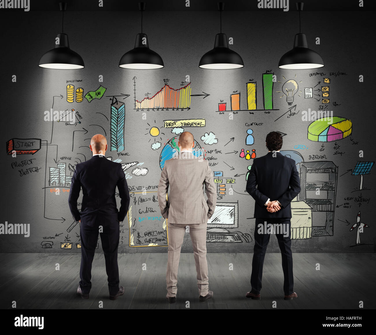 Business team watching a new complex project Stock Photo - Alamy