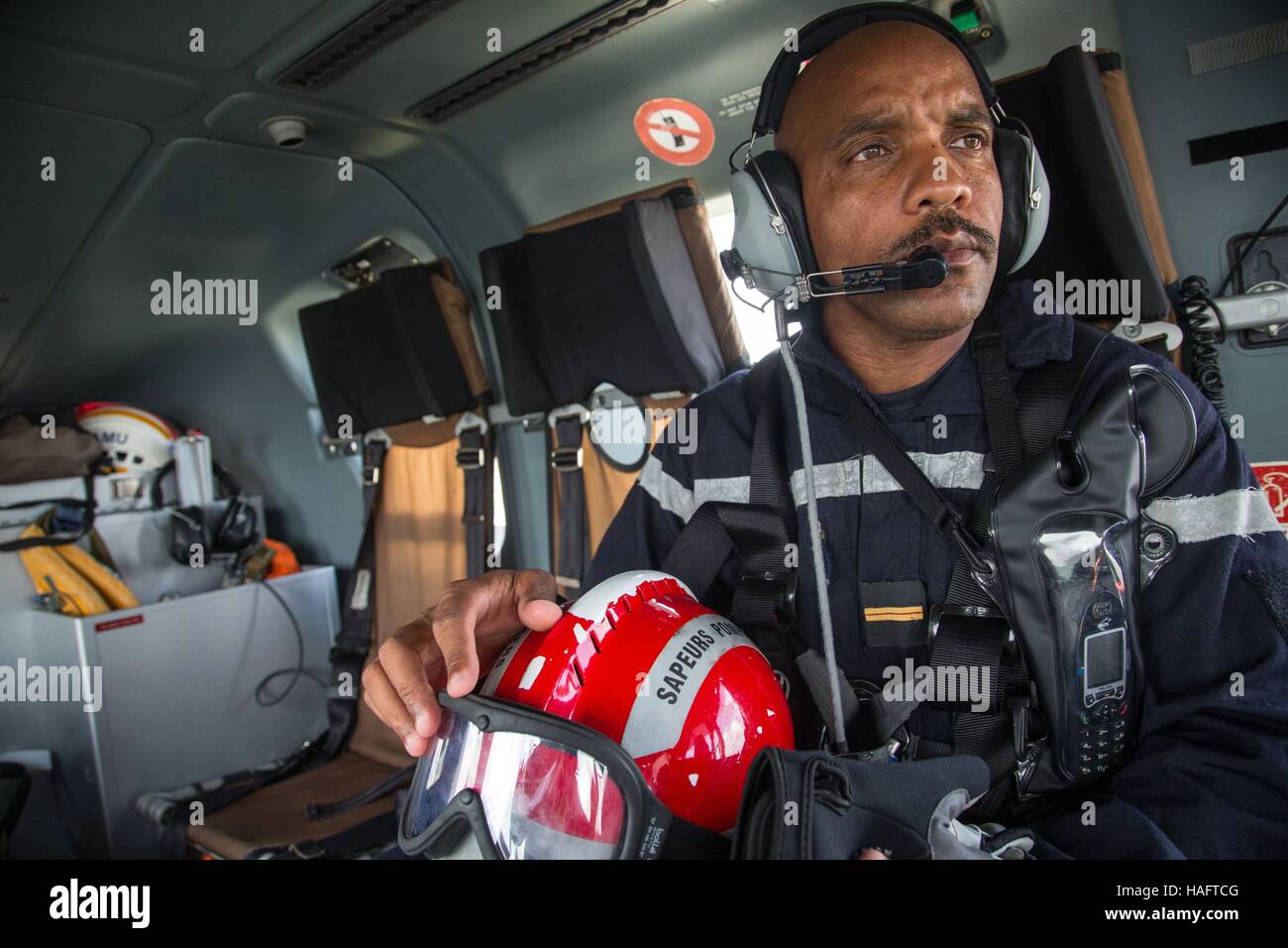 Security with aid worker hi-res stock photography and images - Alamy
