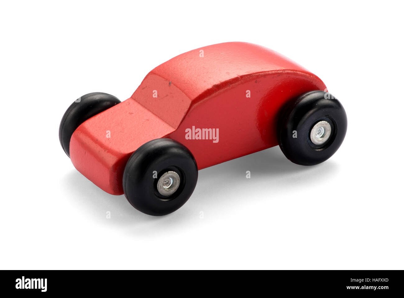Red wooden toy car on white background with natural shadow Stock Photo ...