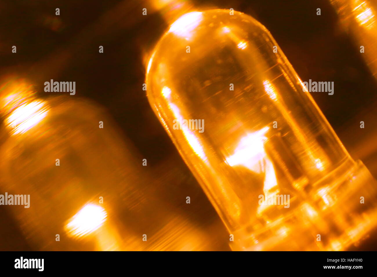 orange illuminated led in the dark closeup view Stock Photo - Alamy