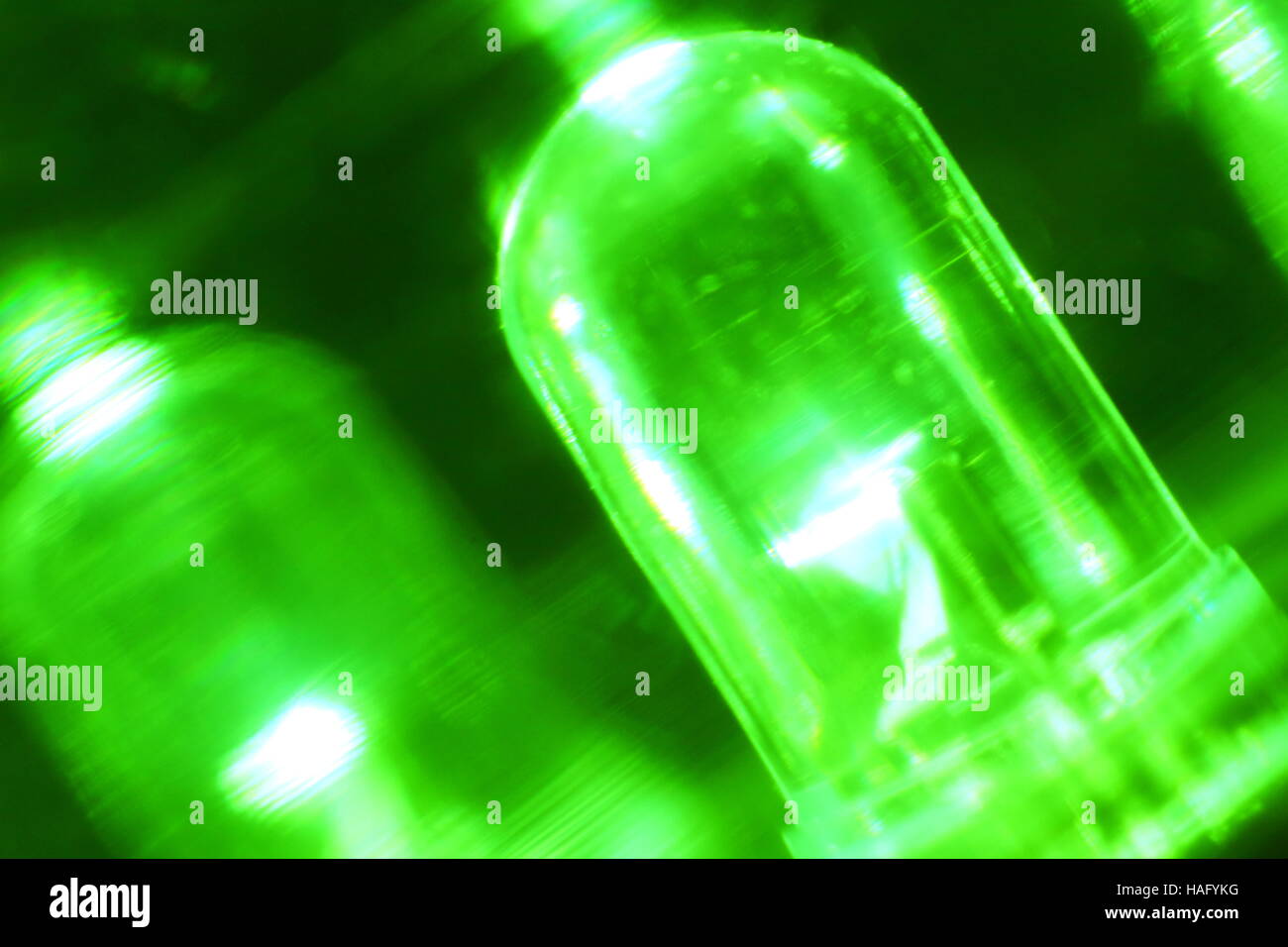 green illuminated led in the dark closeup view Stock Photo - Alamy