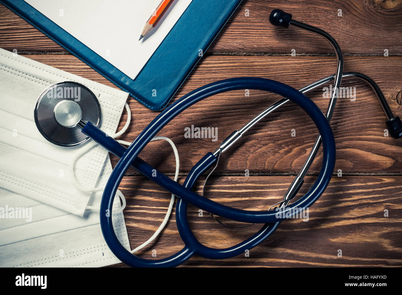 Desk of doctor with medicine things Stock Photo - Alamy