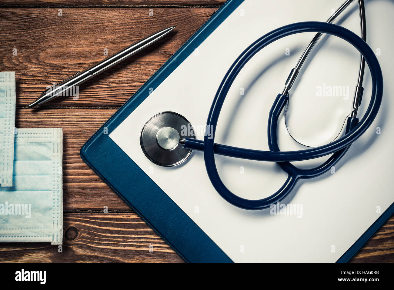 Desk of doctor with medicine things Stock Photo - Alamy