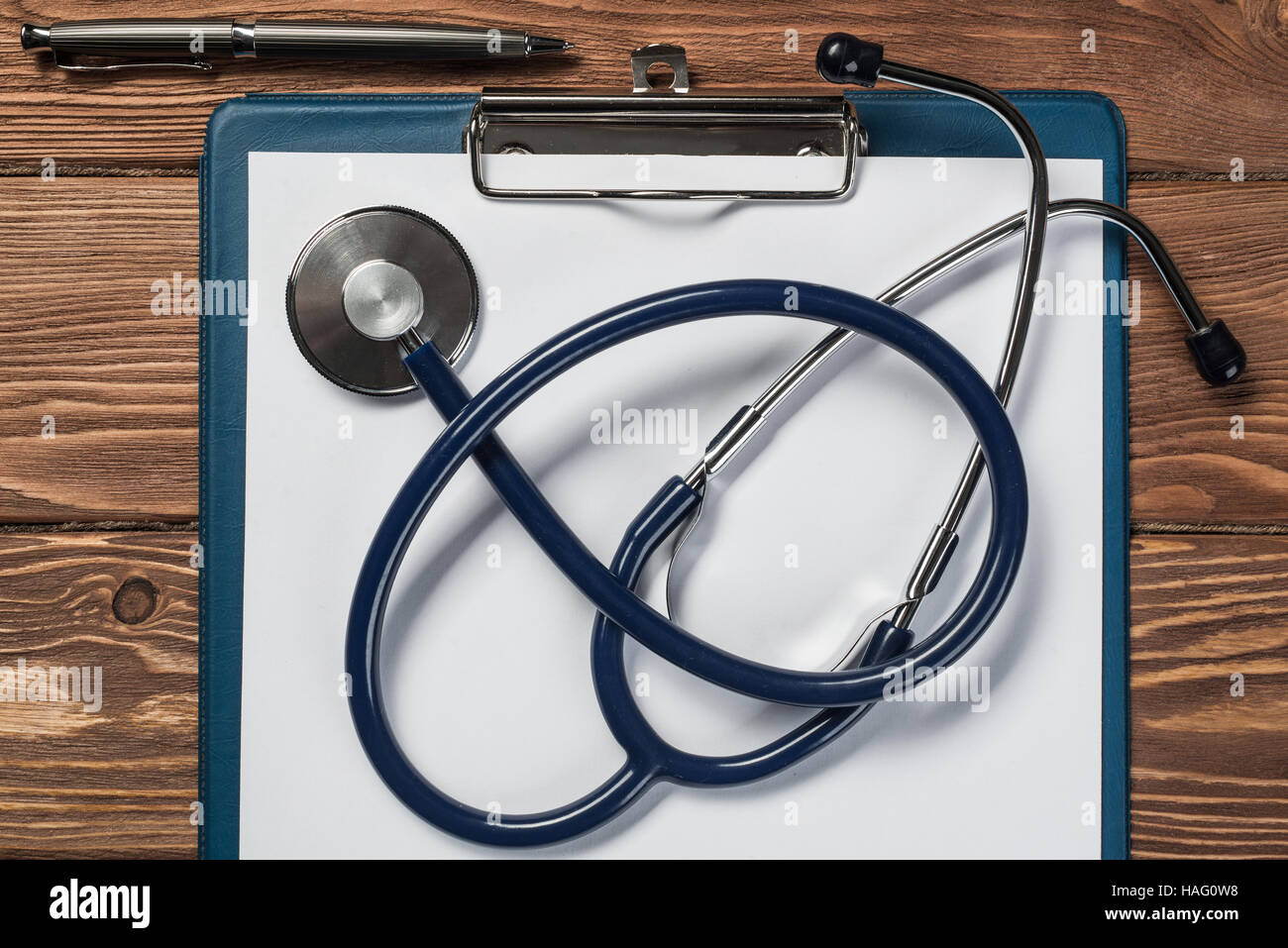 Desk of doctor with medicine things Stock Photo - Alamy