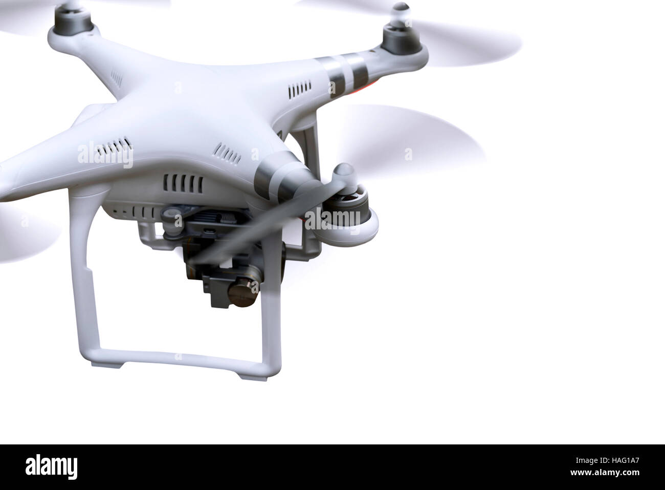 Image of drone flying isolated over white background Stock Photo - Alamy