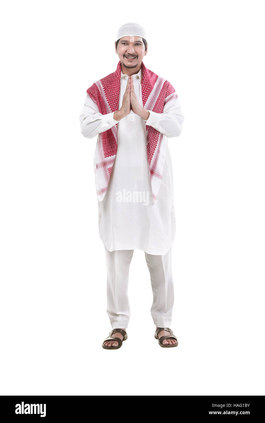 Young muslim man smiling isolated over white background Stock Photo - Alamy