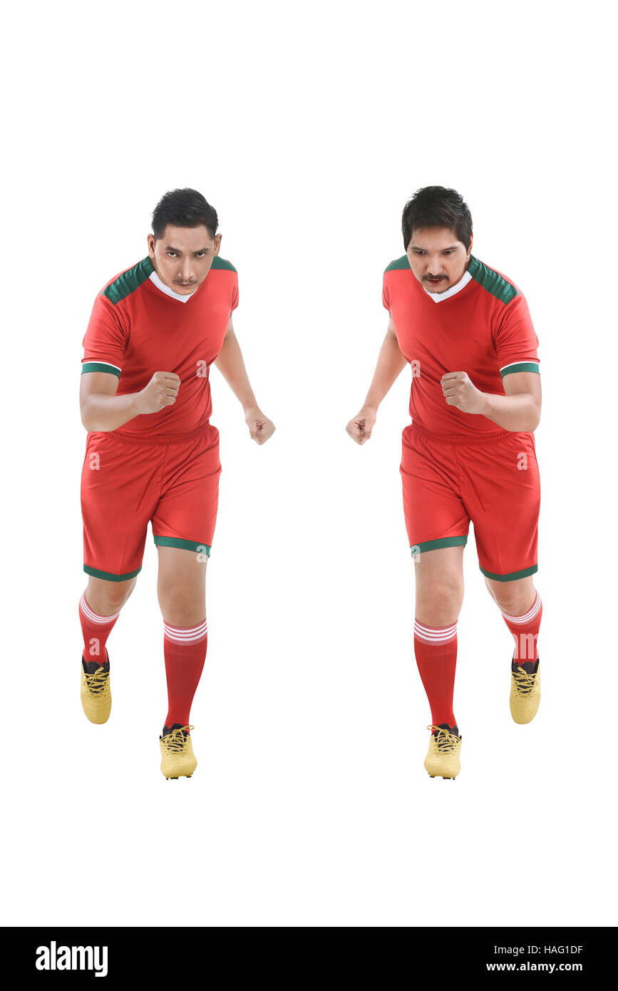 Image of two asian football player running isolated over white ...