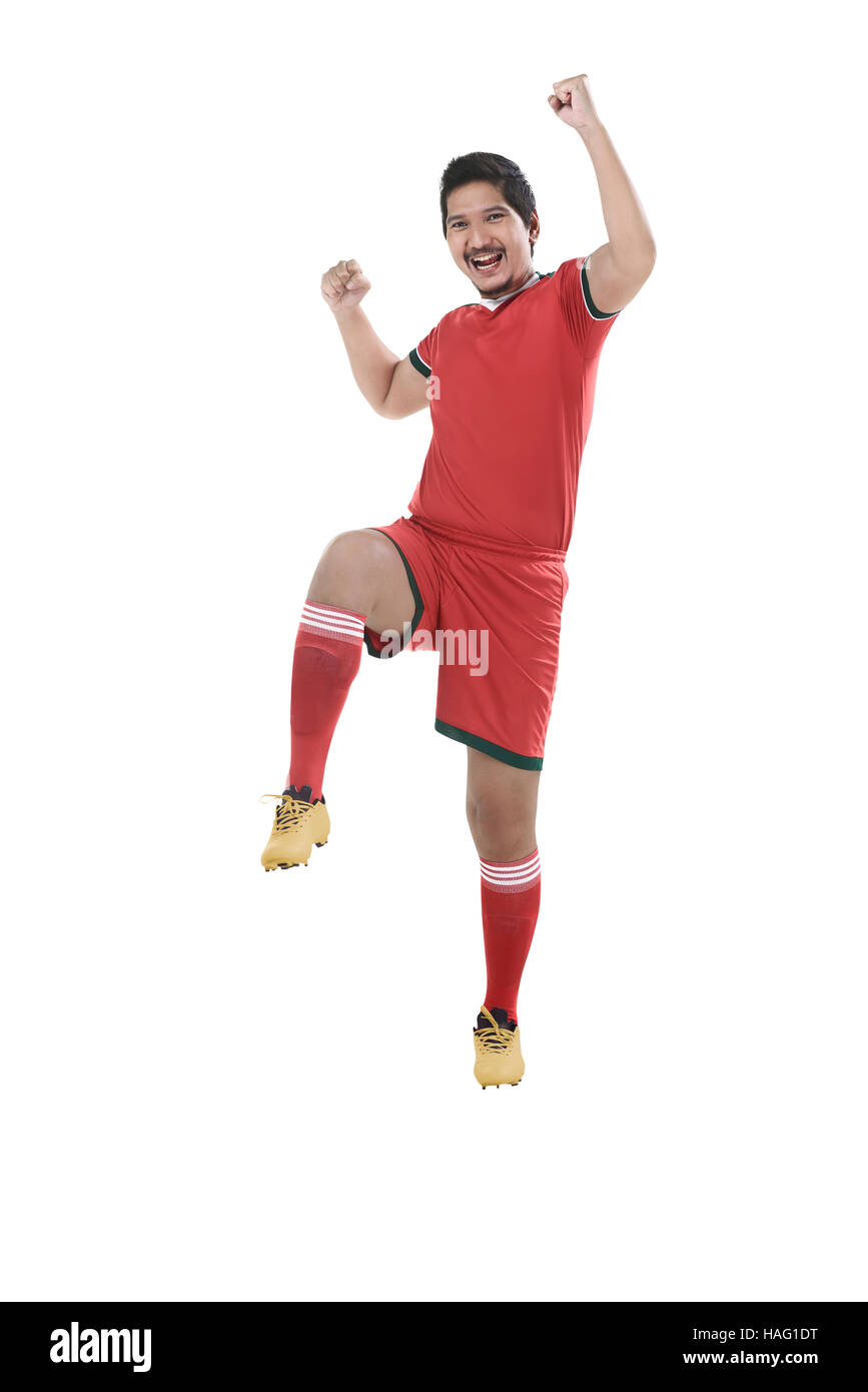 Image of winning football player after scoring isolated over white ...