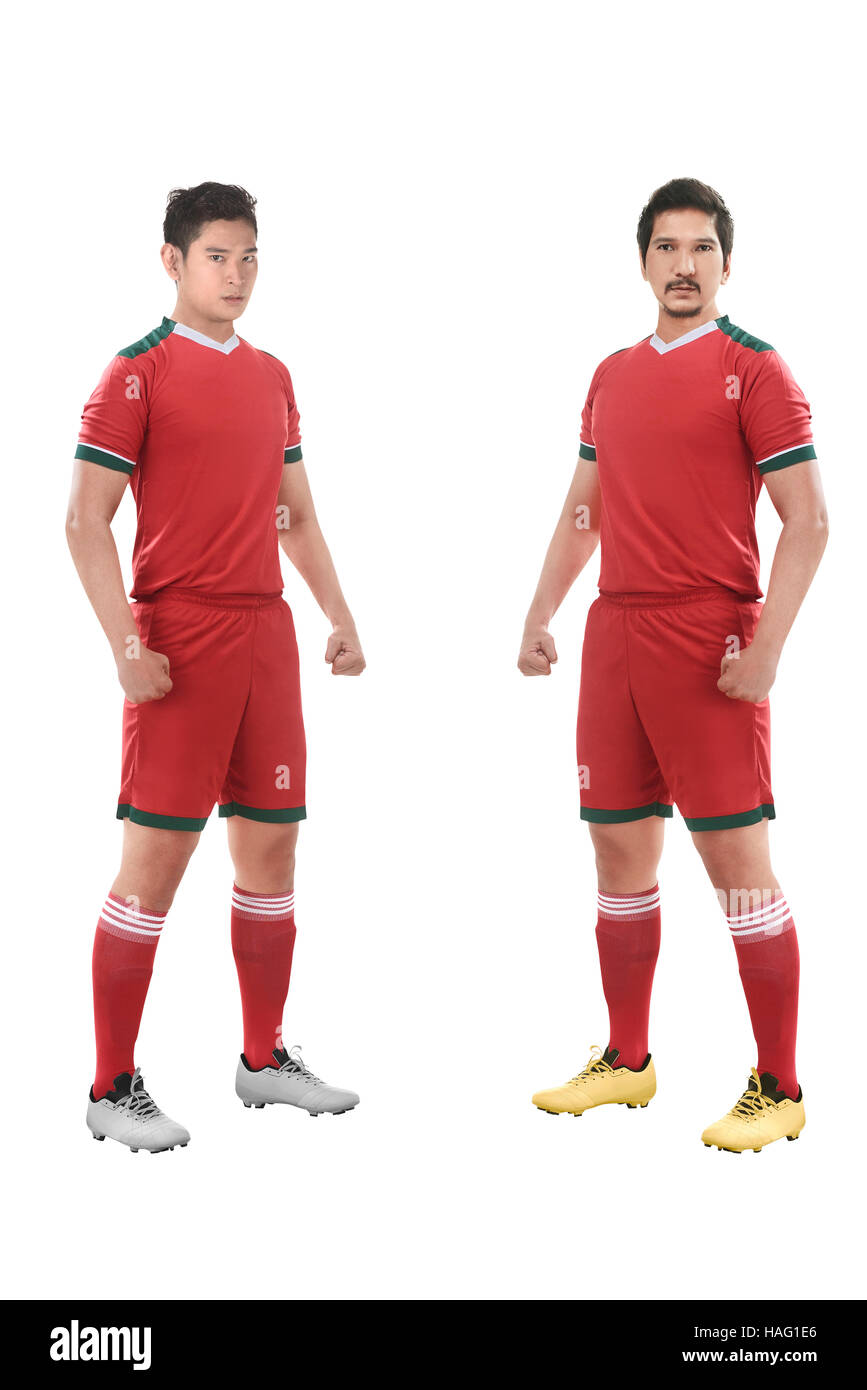 Two asian football player standing isolated over white background Stock ...