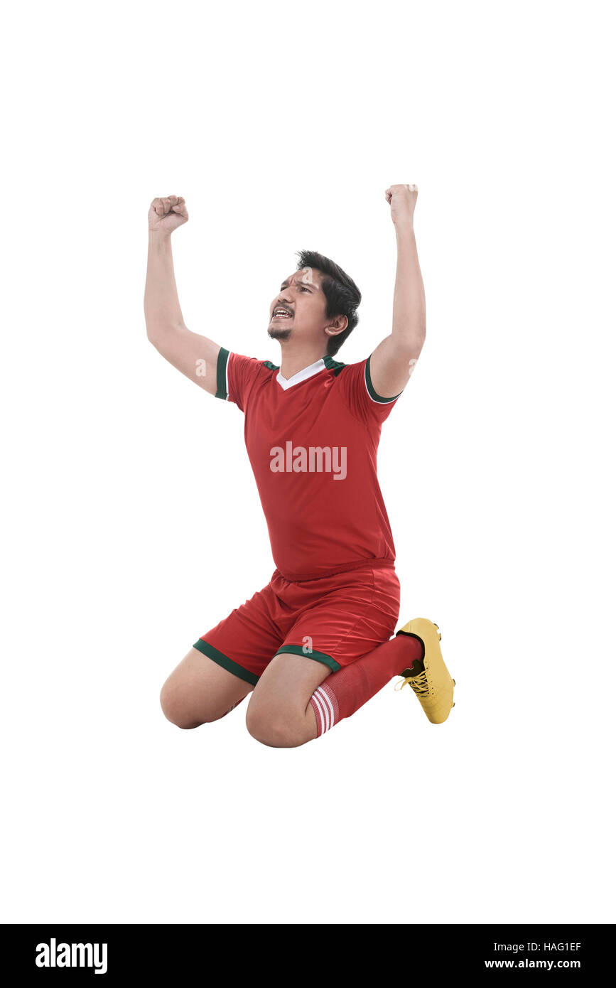 Image of winning football player after scoring Stock Photo - Alamy