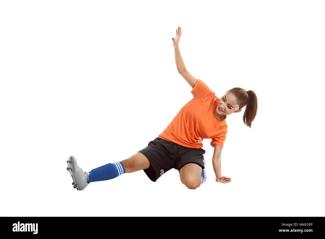 Sliding tackle football Cut Out Stock Images & Pictures - Alamy