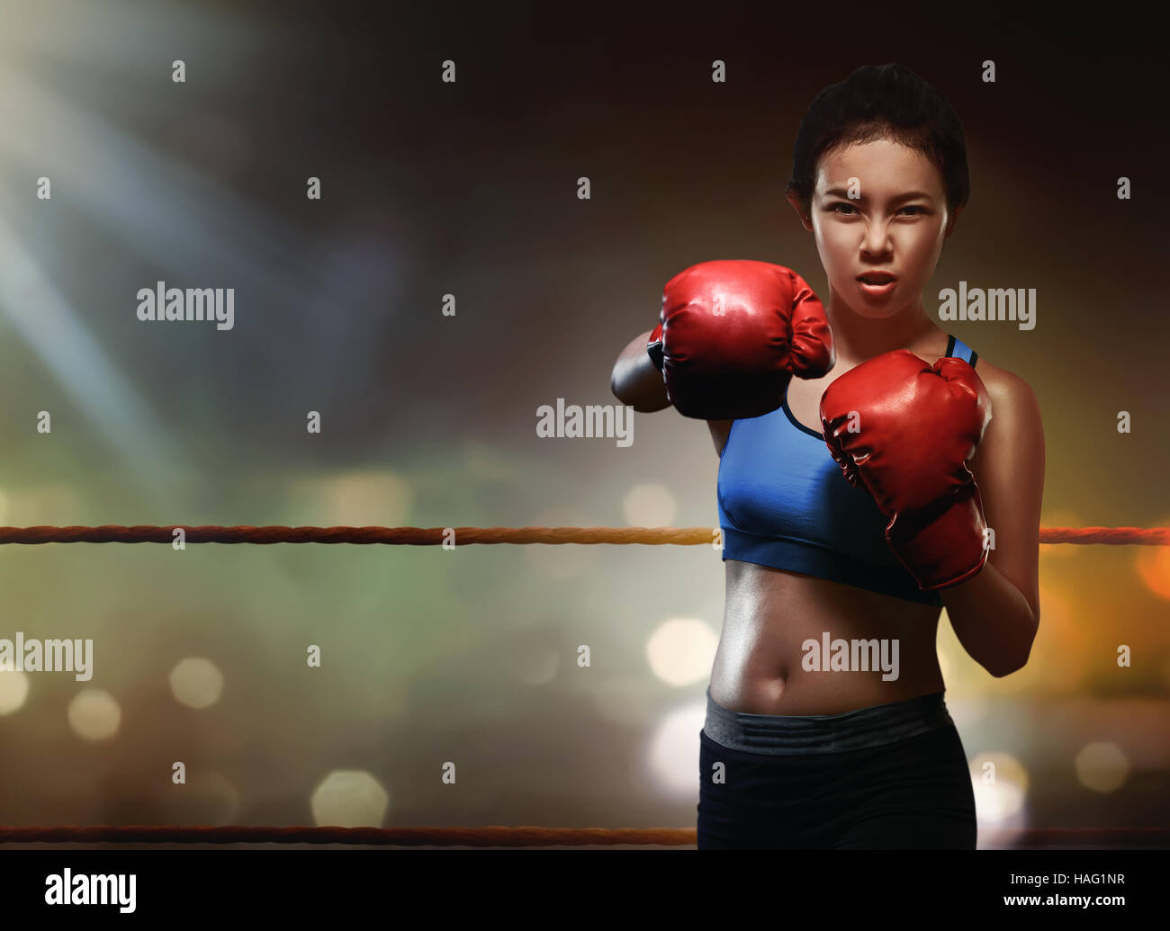 Beauty asian woman boxer with red boxing gloves against blurred ...