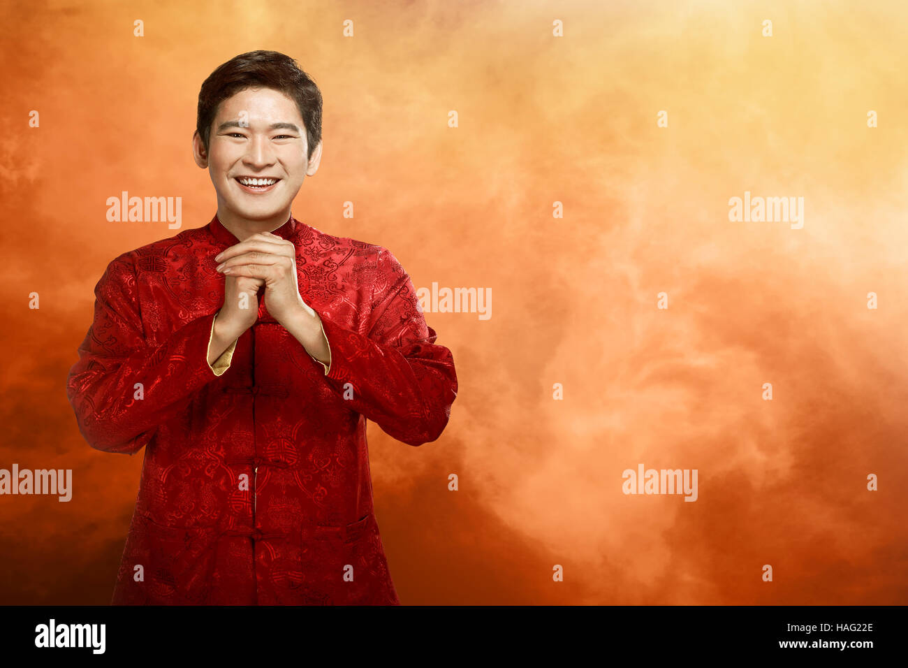 Chinese man in cheongsam suit. Chinese new year concept Stock Photo - Alamy