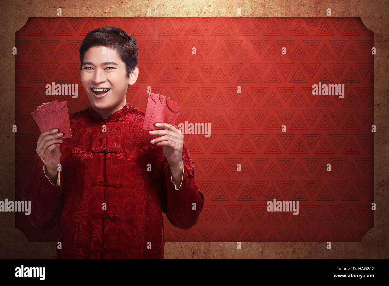 Chinese man smiling. Happy chinese new year concept Stock Photo - Alamy