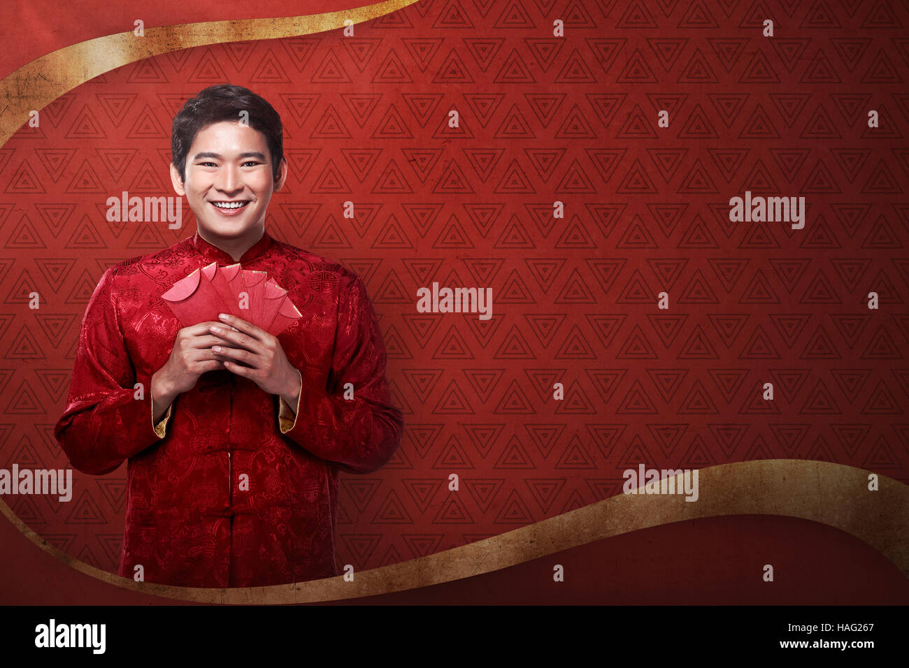 Chinese man smiling. Happy chinese new year concept Stock Photo - Alamy