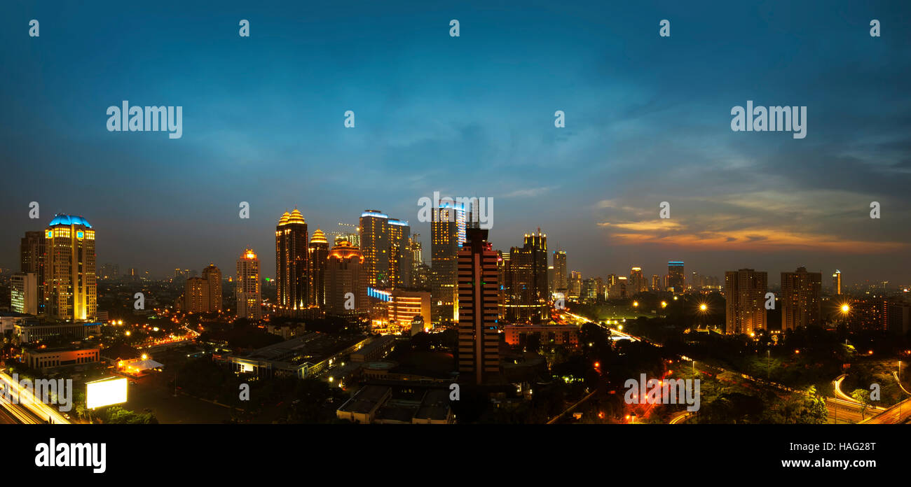 Jakarta city at night with modern building Stock Photo - Alamy
