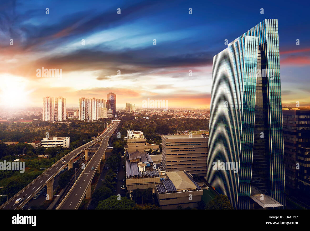 Jakarta city at night with modern building Stock Photo - Alamy