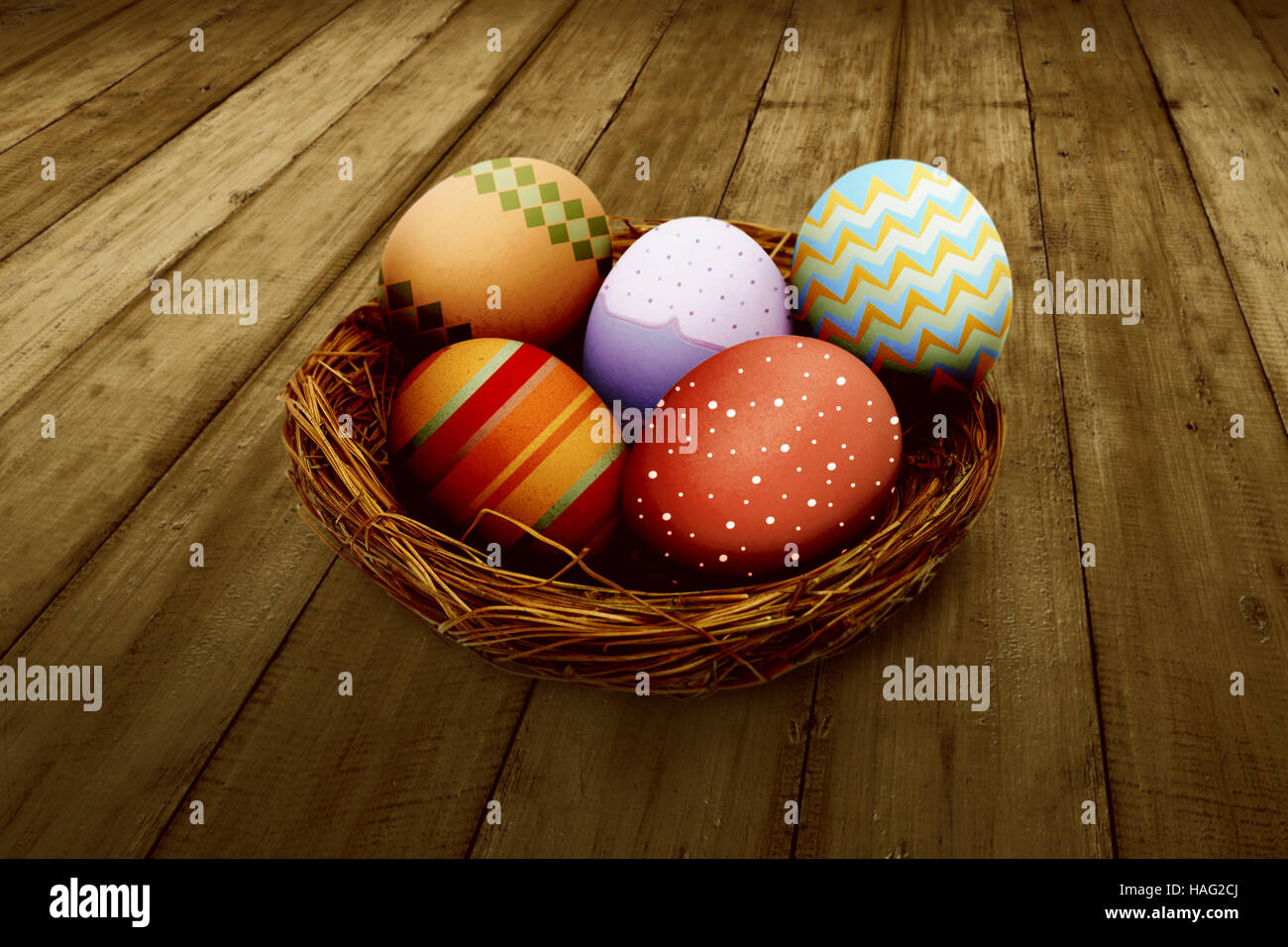 Colorful eggs in one nest. Happy easter concept Stock Photo - Alamy