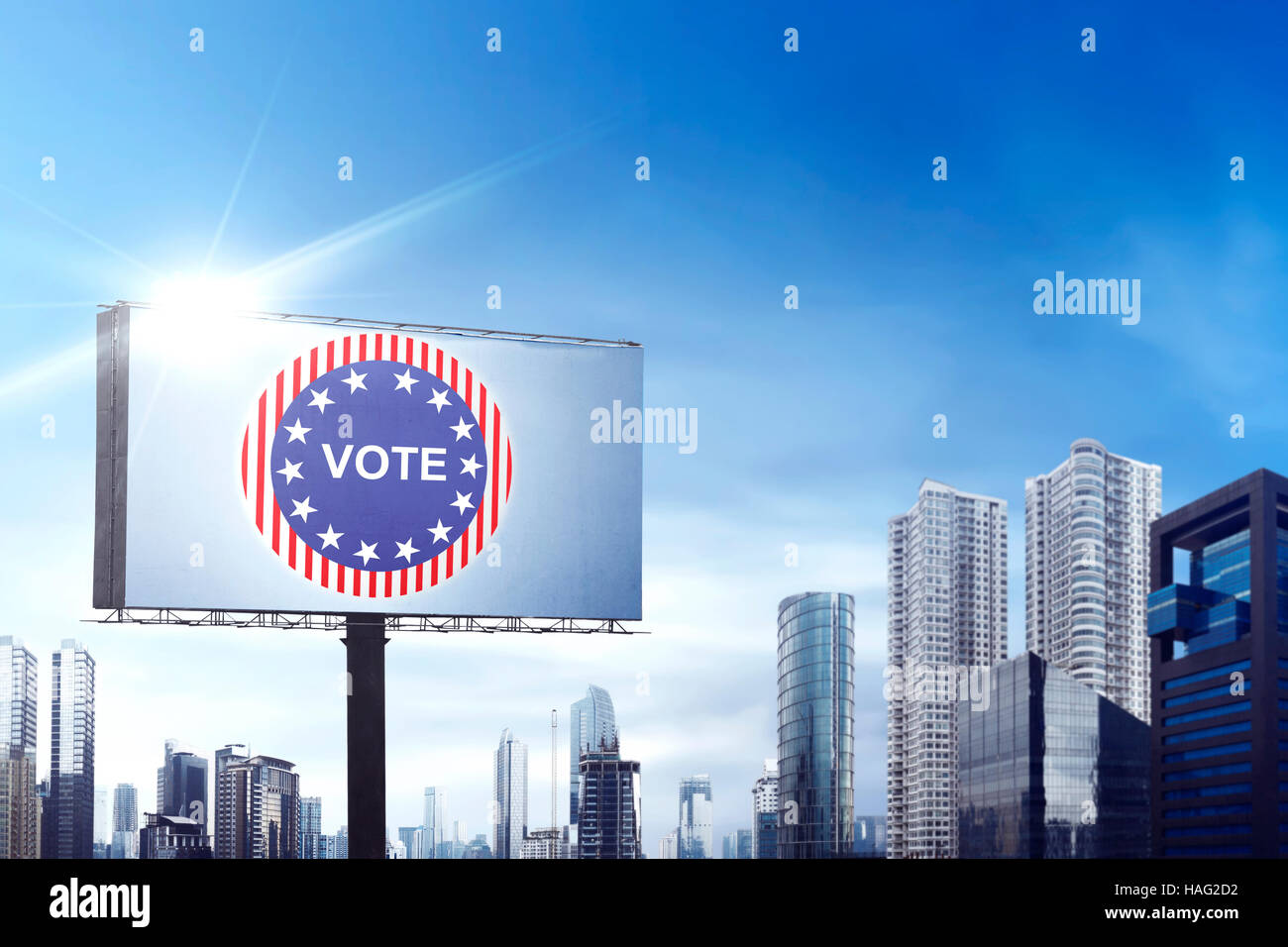 Billboard show a vote pin at daylight with skyscraper Stock Photo - Alamy