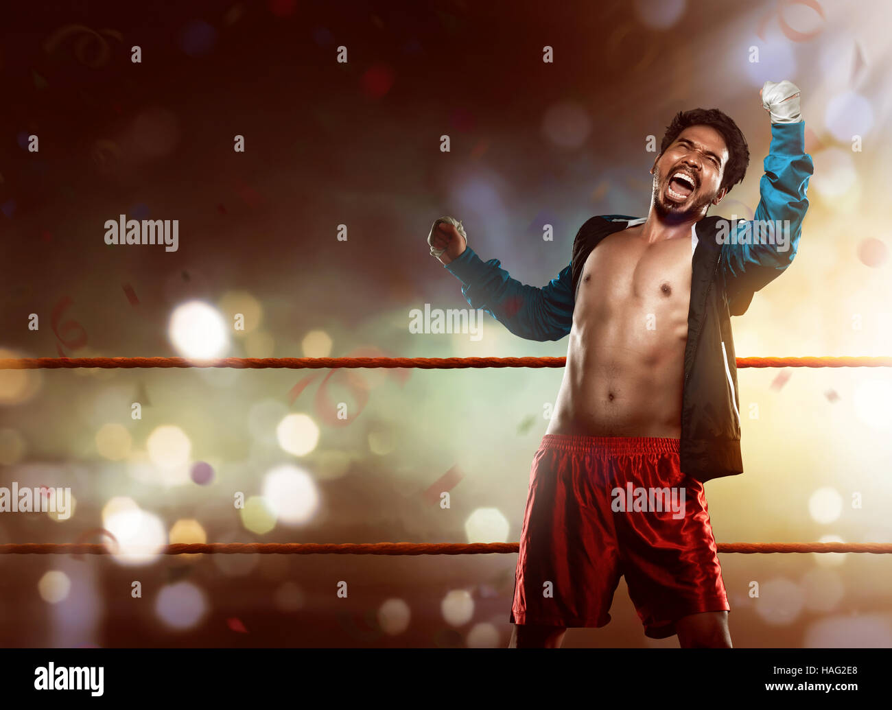 Asian boxer posing celebrate after victory on boxing ring Stock Photo ...