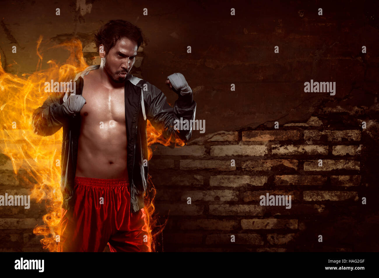 Muscular asian boxer man with sportswear when doing practicing Stock ...