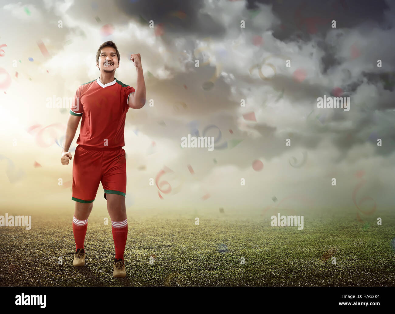Image of winning football player after score in a match Stock Photo - Alamy