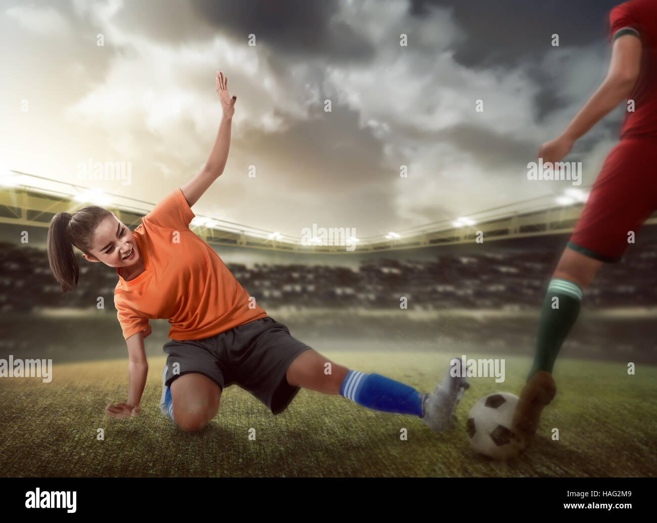 Sliding tackling slide tackle hi-res stock photography and images - Alamy