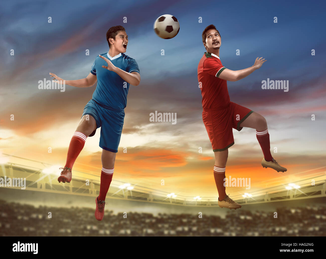 Image of soccer player header on the stadium Stock Photo - Alamy