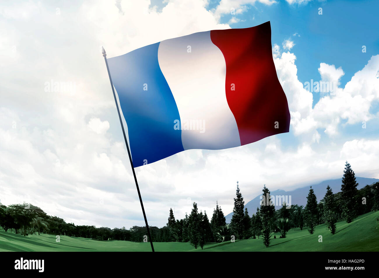 France flag on the hill with blue sky background Stock Photo - Alamy