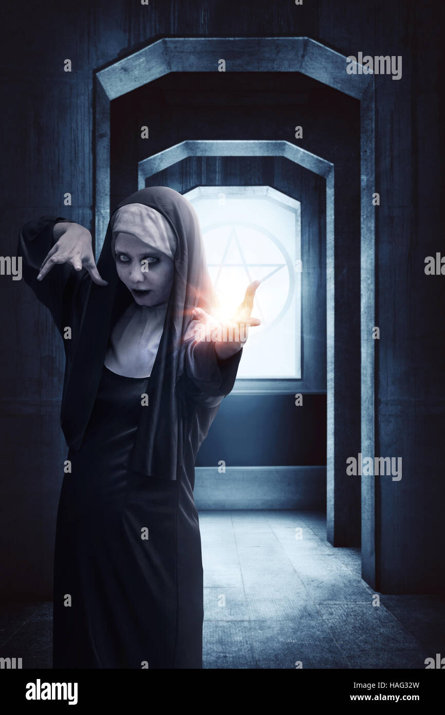 Scary devil nun for halloween concept image Stock Photo - Alamy
