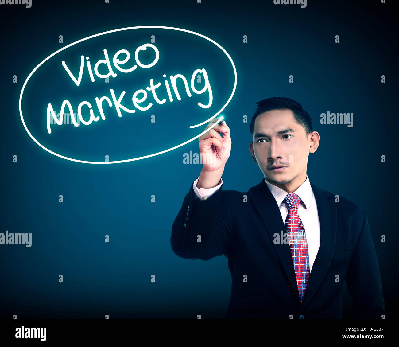 Business man writing video marketing with handwriting and circle Stock ...