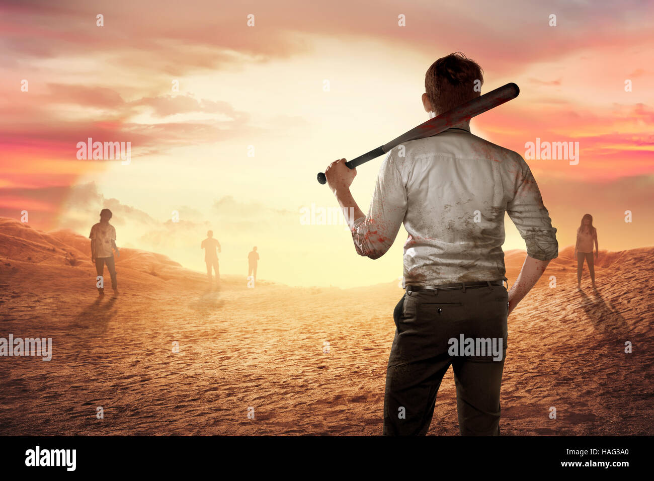 A person man holding a bloody bat at sunset because the zombies will ...