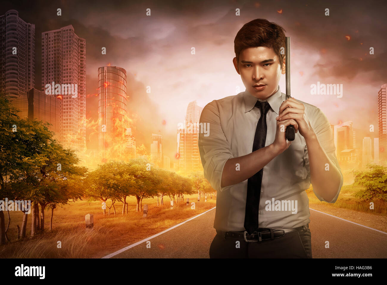 Secret agent holding gun ready to fire Stock Photo - Alamy